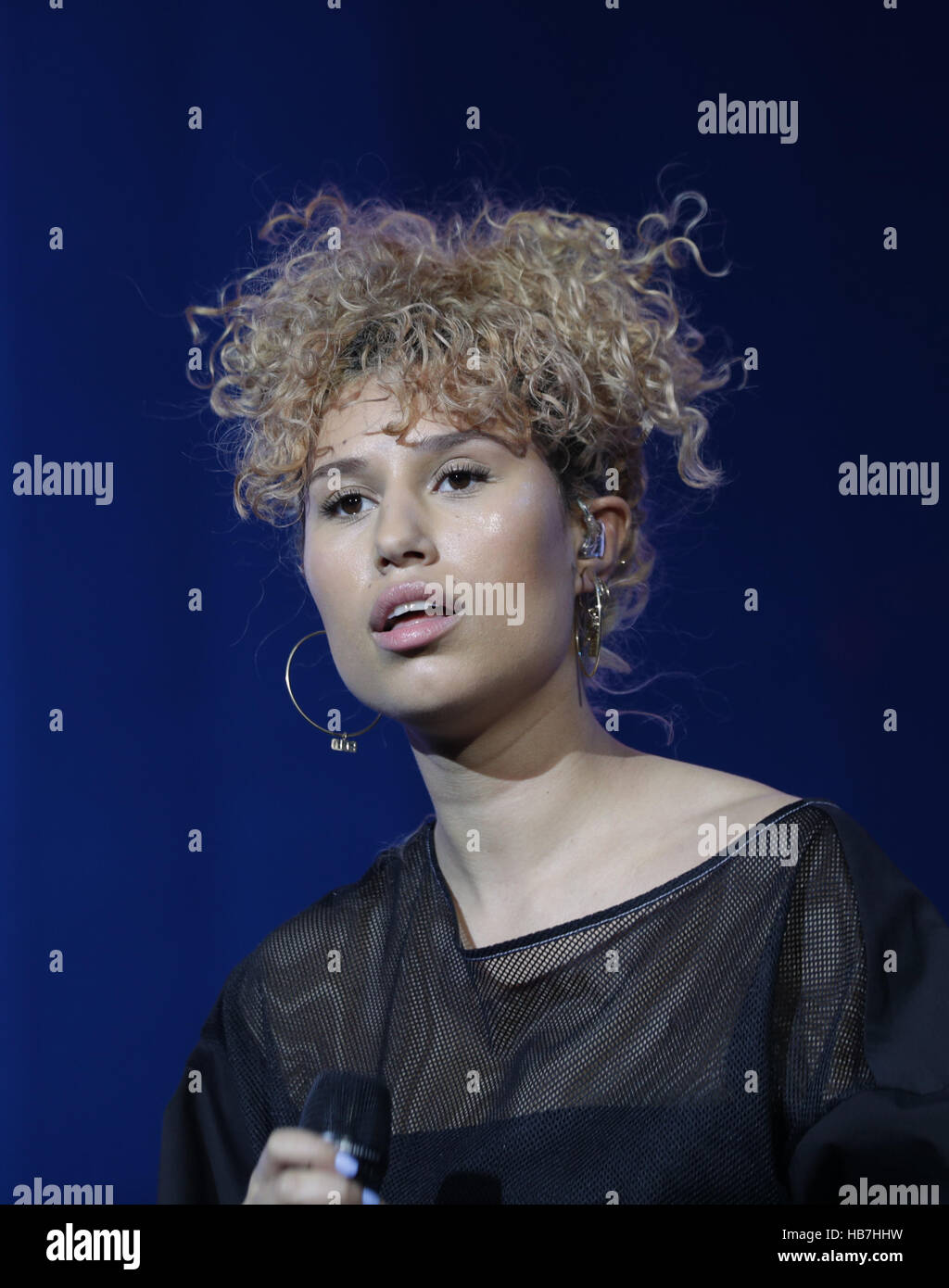 Singer Raye performs on stage with Jonas Blue during Capital's Jingle ...