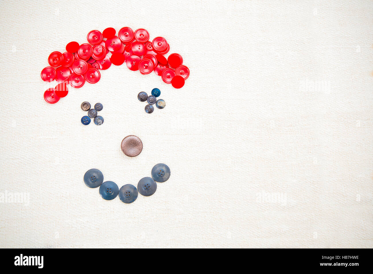 Happy smiley face made out of colorful buttons Stock Photo - Alamy