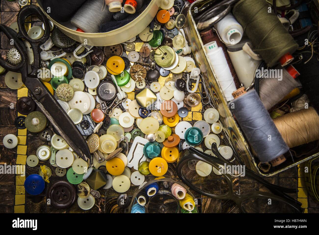 Many tools for hand-made object buttons and threads Stock Photo - Alamy