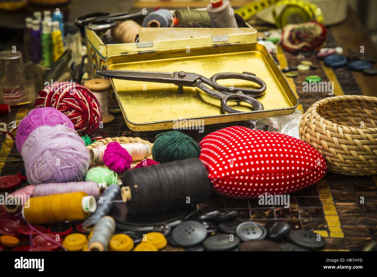 Many tools for hand-made object buttons and threads Stock Photo - Alamy