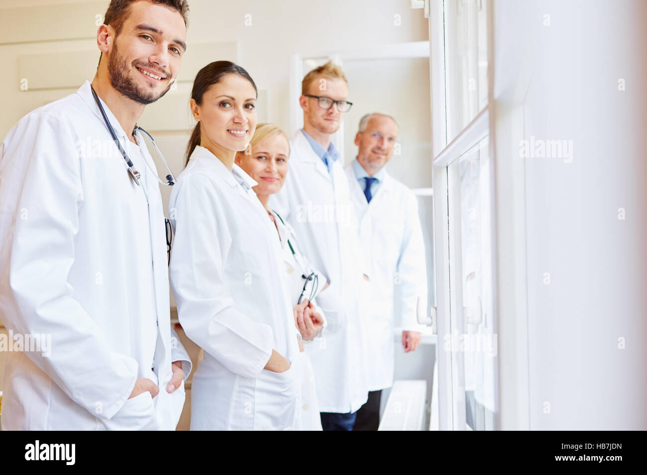Medical clinic staff with group of doctors and assistants Stock Photo ...