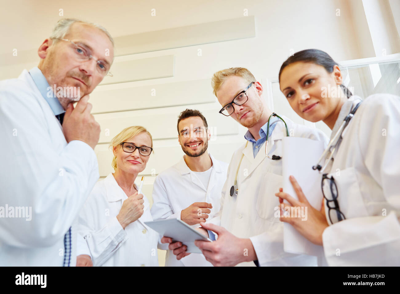 Doctors thinking about medical problem in cooperation with physicians ...