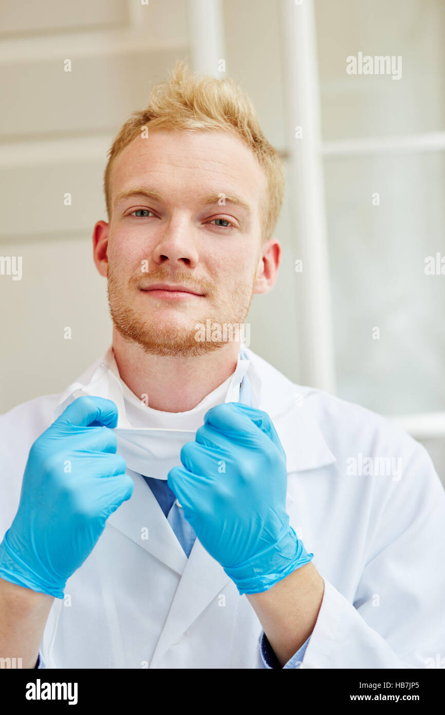 Man as cool surgeon doctor with gloves preparing for surgery Stock ...