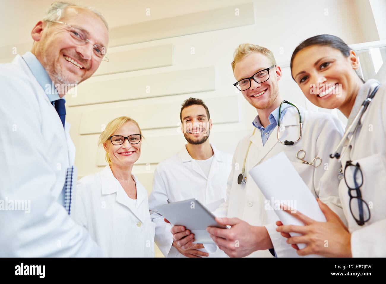 Happy hospital employee hi-res stock photography and images - Alamy
