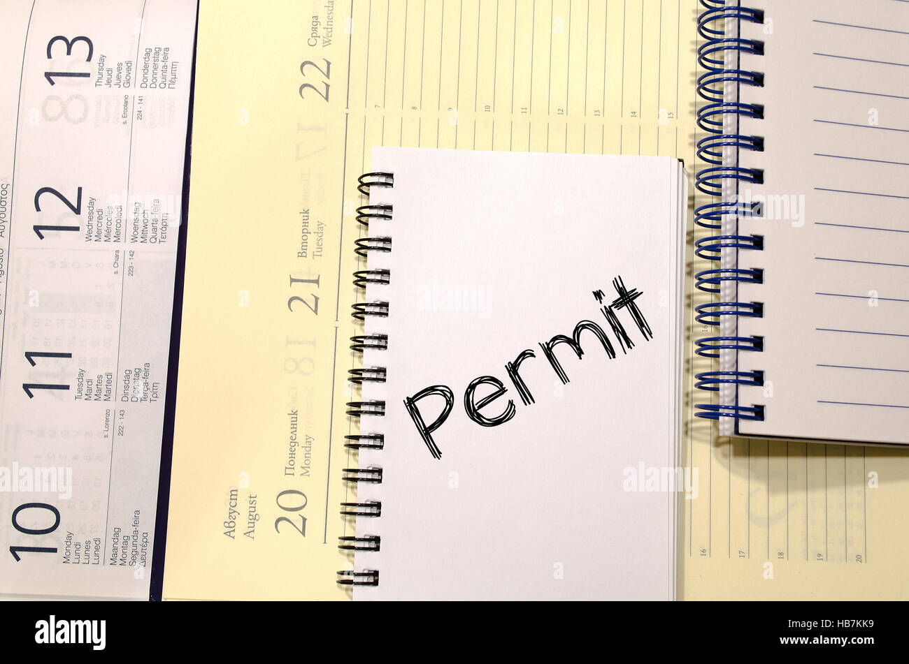 Permit write on notebook Stock Photo - Alamy