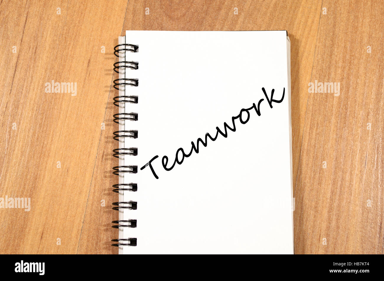 Teamwork write on notebook Stock Photo - Alamy