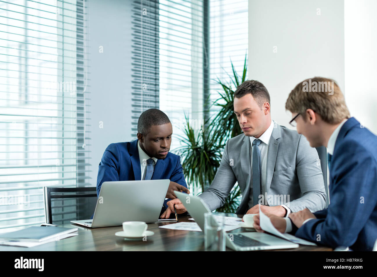 Black professional males hi-res stock photography and images - Alamy