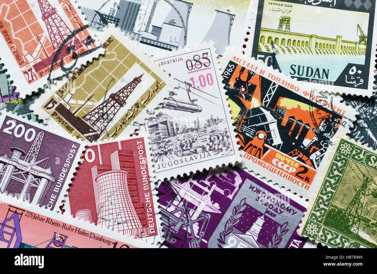 Industry on stamps Stock Photo - Alamy