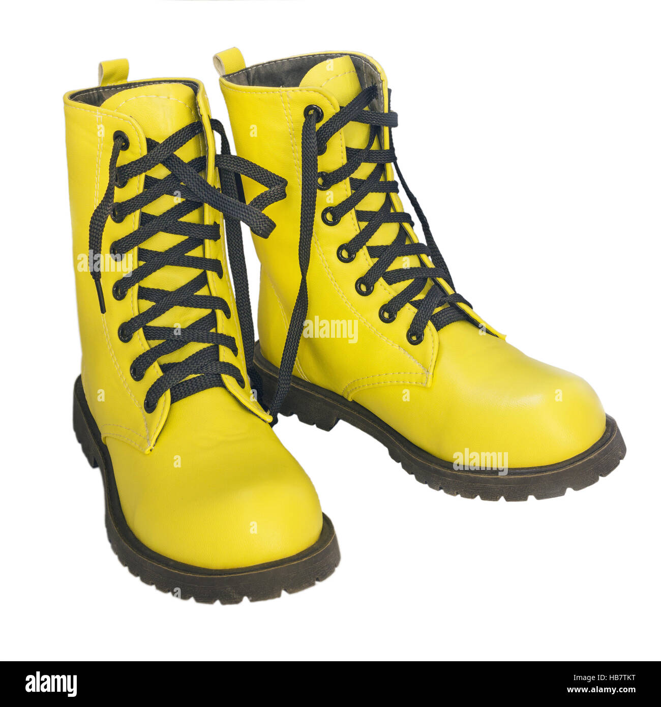 Yellow high shoes on a white background Stock Photo - Alamy