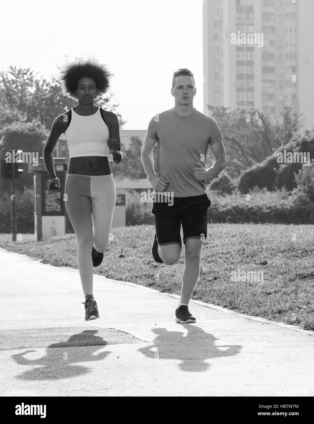 Female running legs marathon Black and White Stock Photos & Images - Alamy