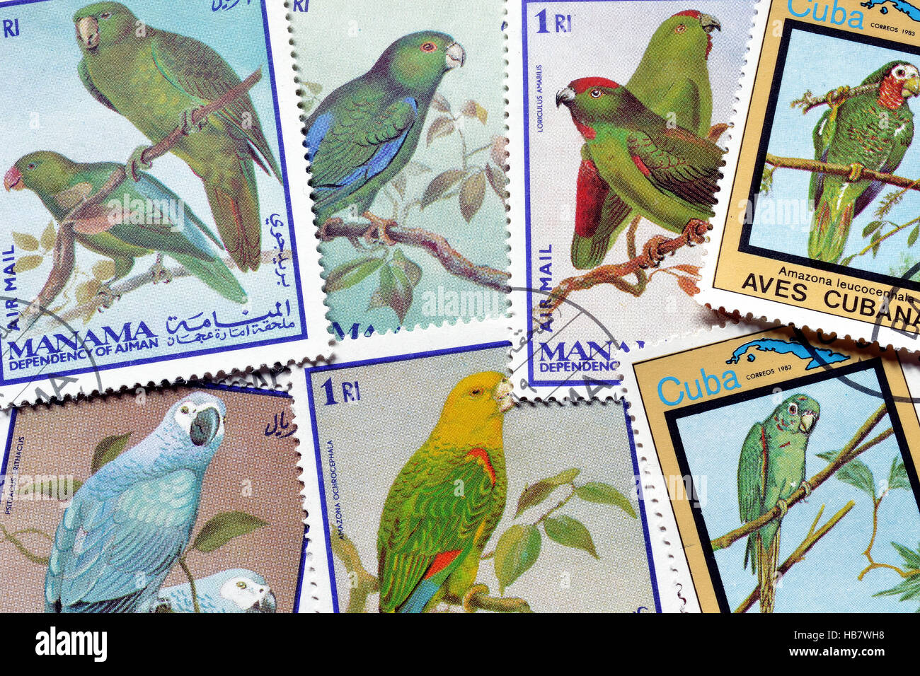 Parrots on stamps Stock Photo - Alamy