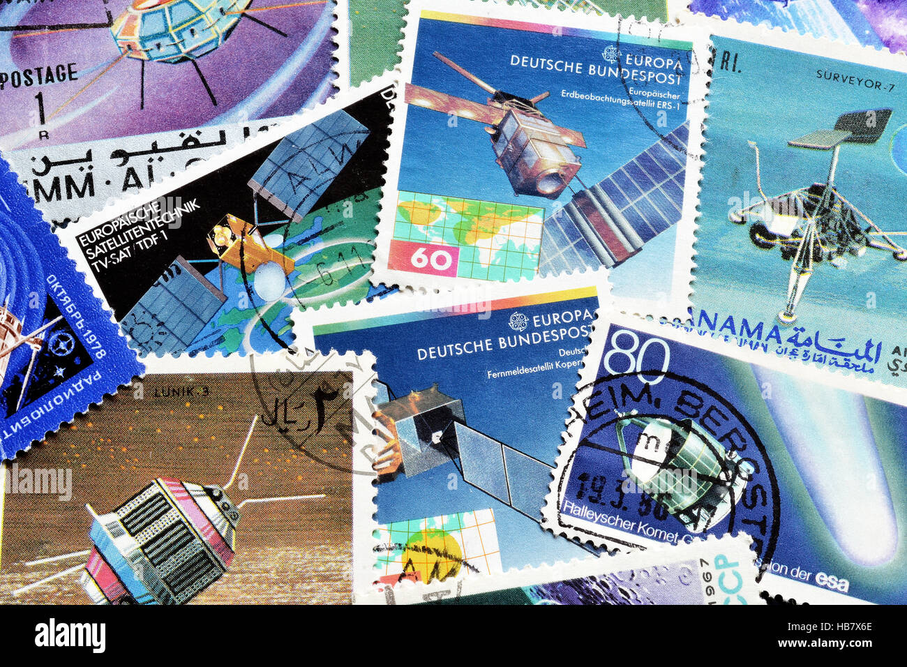 Satellites on stamps Stock Photo - Alamy