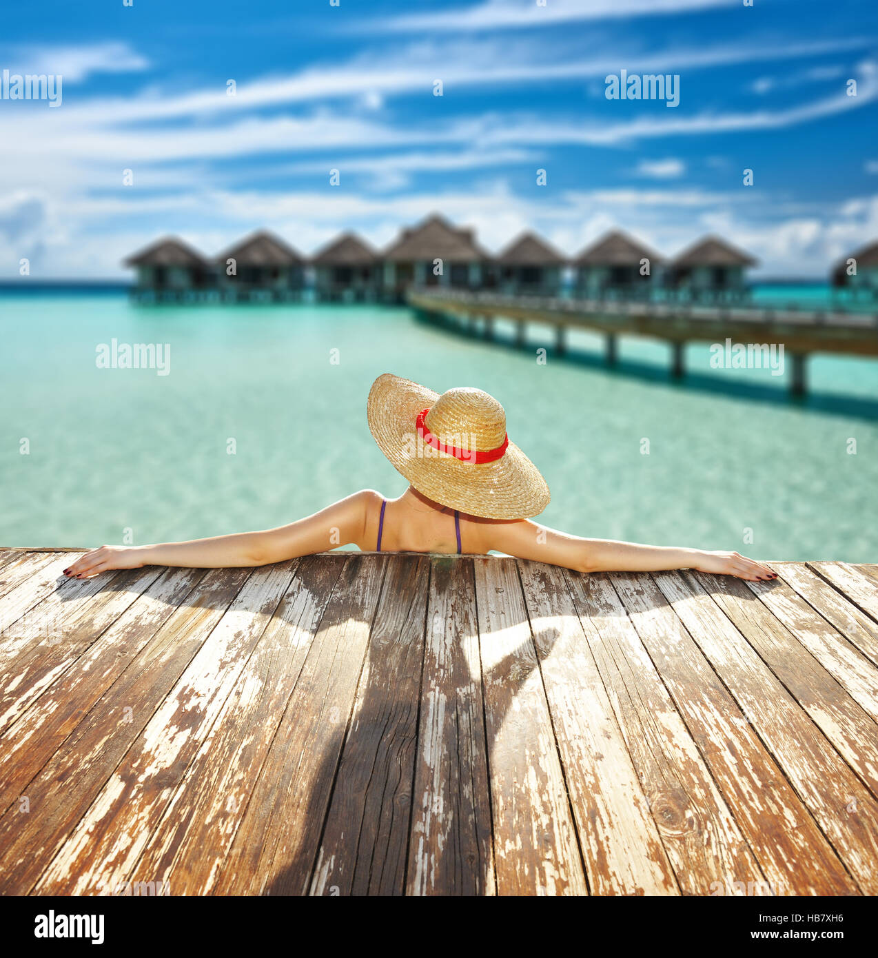 Woman at poolside Stock Photo - Alamy