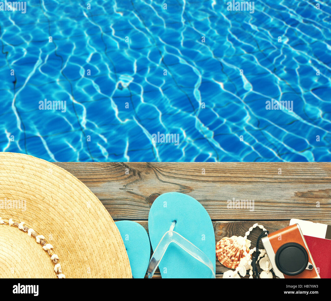Beach items at pool Stock Photo - Alamy