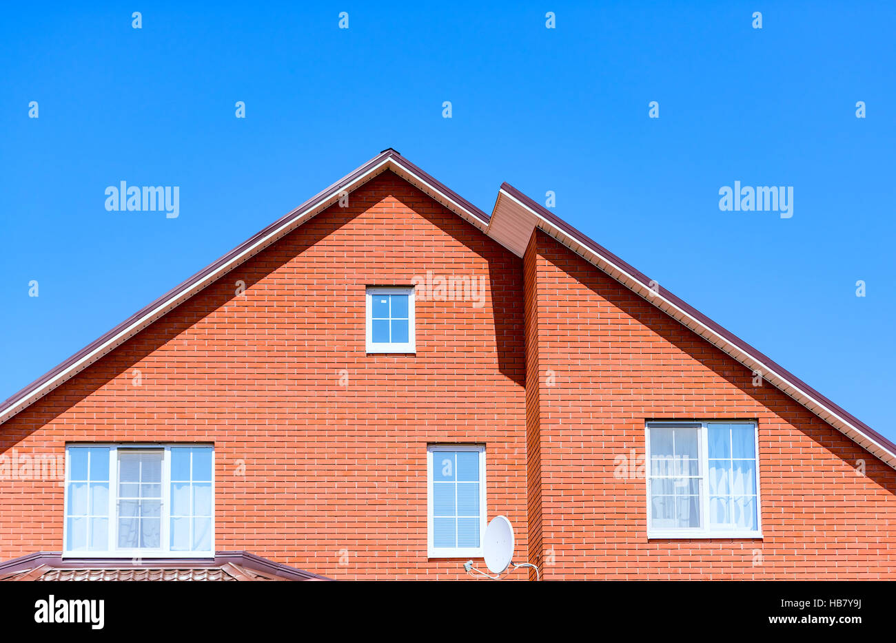 house with a gable roof window Stock Photo - Alamy