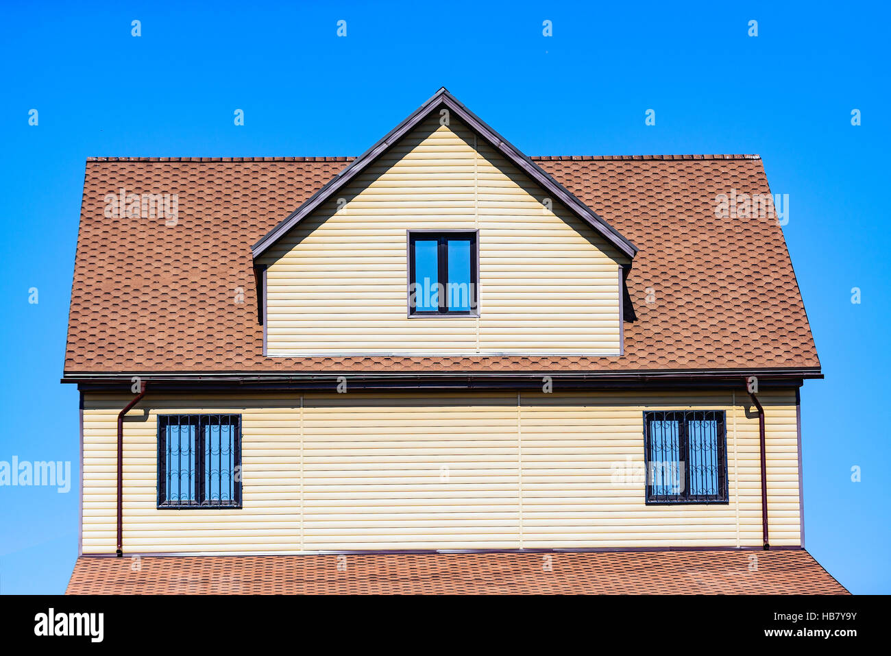 house with a gable roof window Stock Photo - Alamy