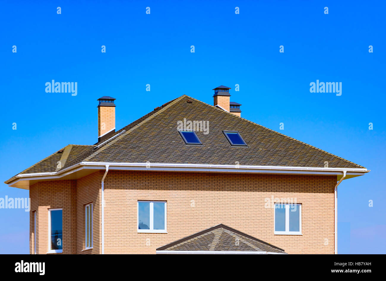 house with a gable roof window Stock Photo - Alamy