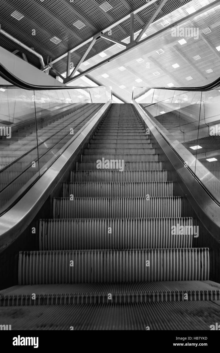 Escalators moving stairs Black and White Stock Photos & Images - Alamy