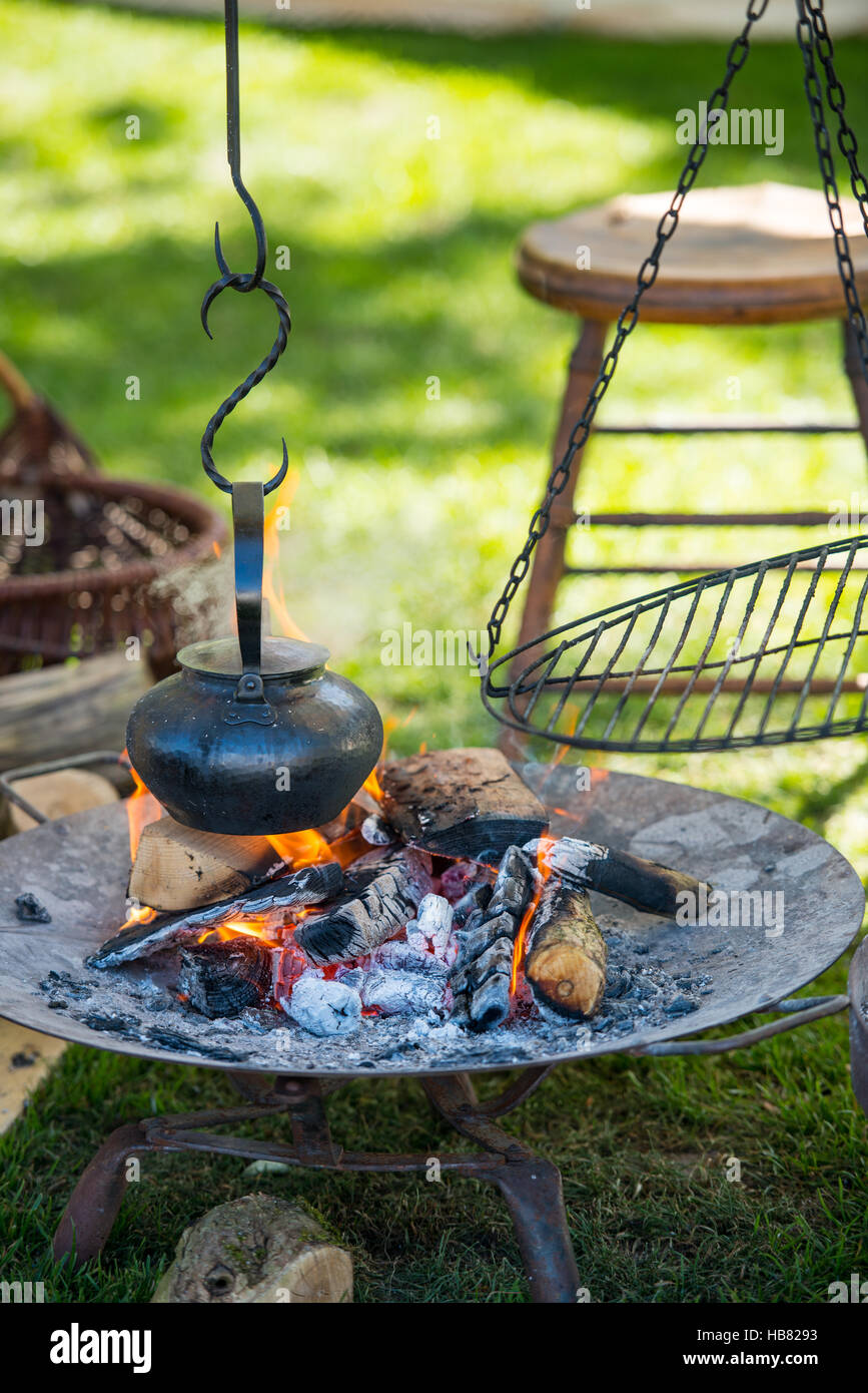 boiling over the fire Stock Photo - Alamy