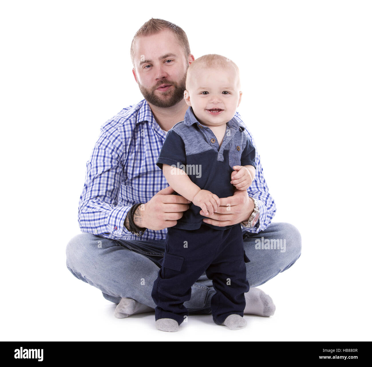 Father baby son holding Cut Out Stock Images & Pictures - Alamy