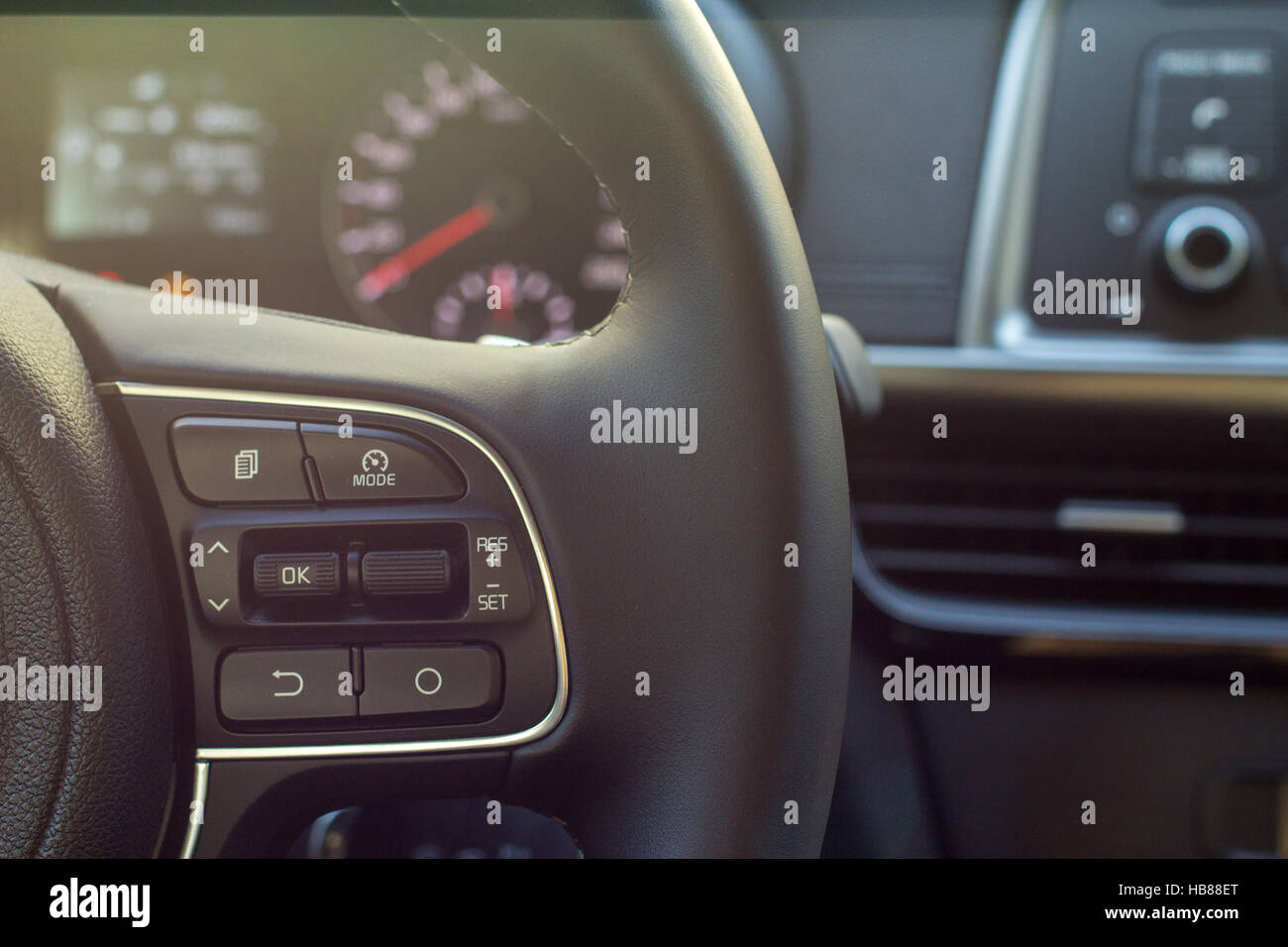 Modern car interior steering wheel element Stock Photo - Alamy