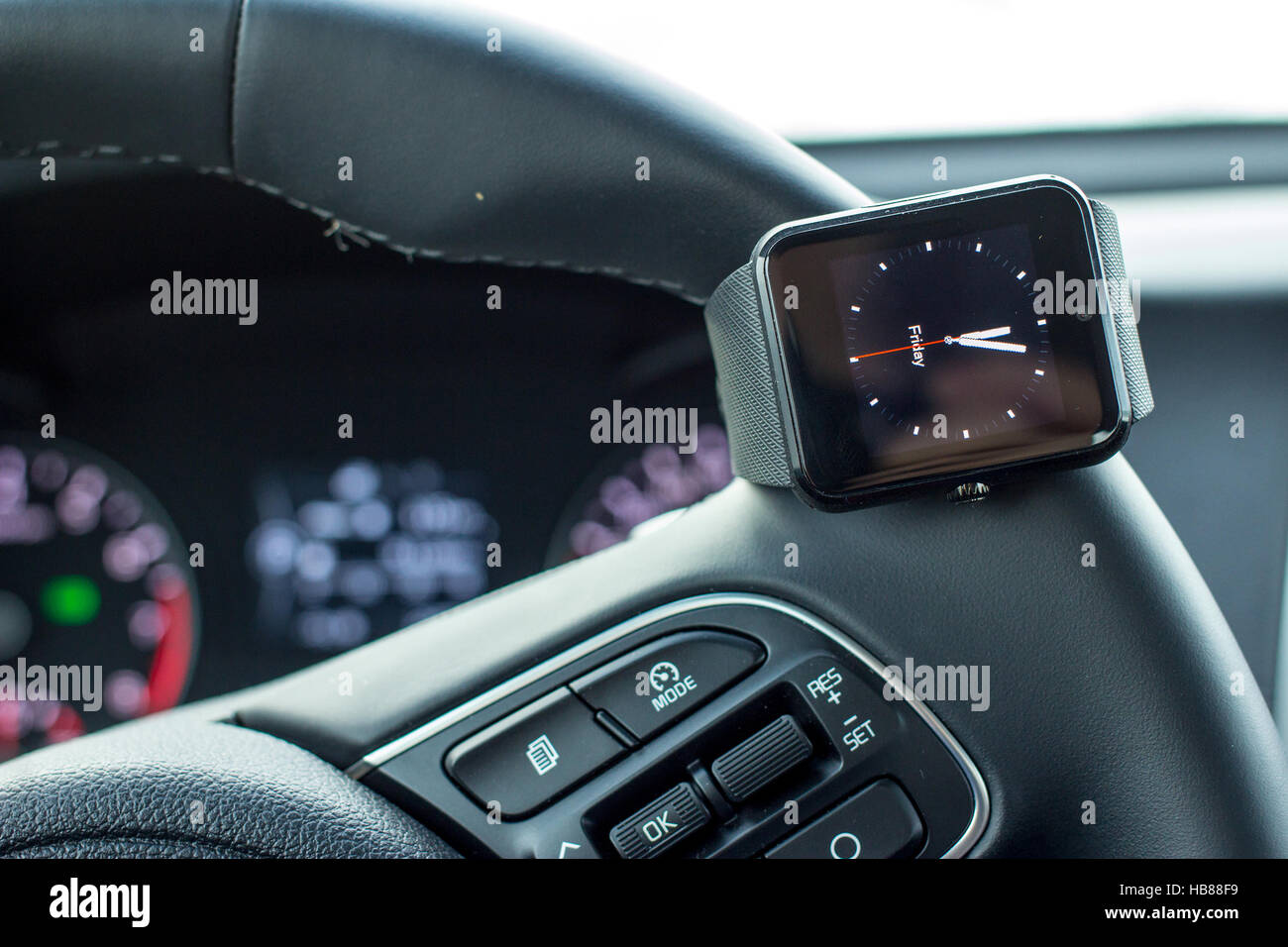 Modern car interior with smart watch on gear stick Stock Photo - Alamy