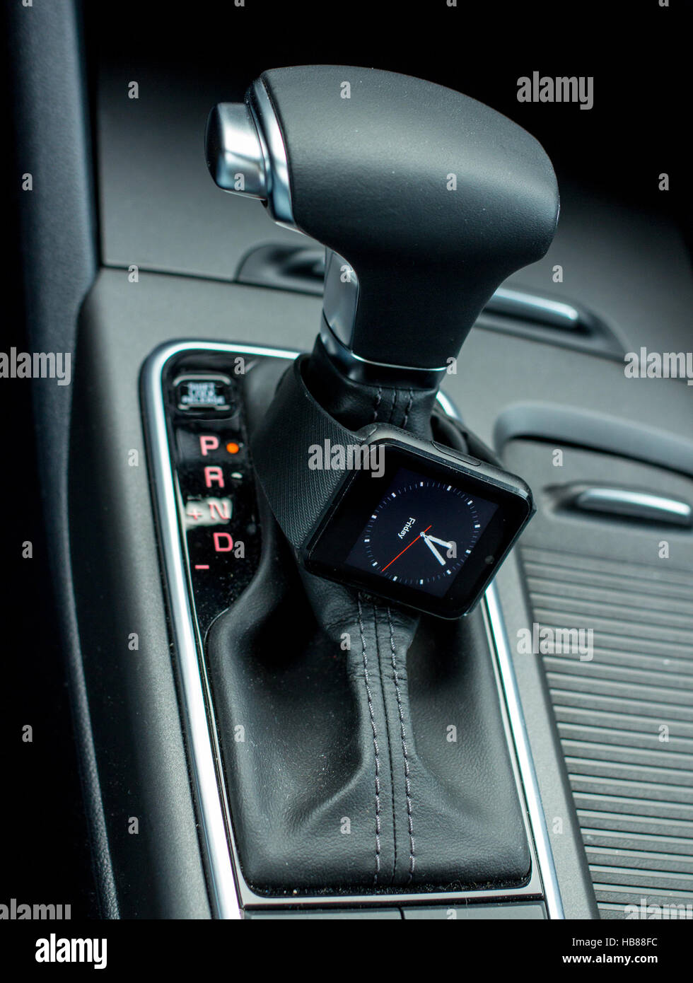 Modern car interior with smart watch on gear stick Stock Photo - Alamy