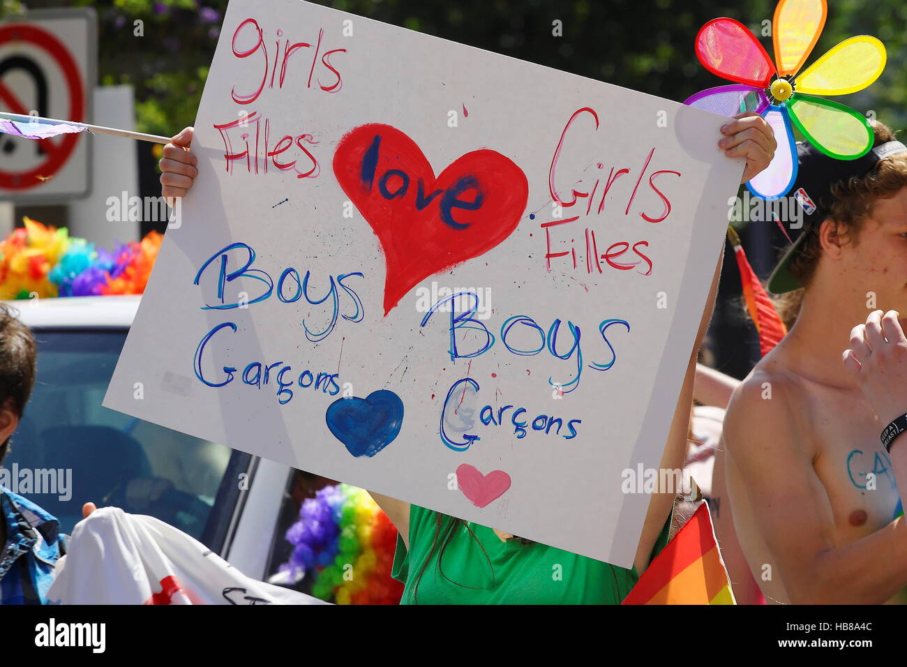 girls love girl, boys love boys banner seen in the Montreal Pride ...