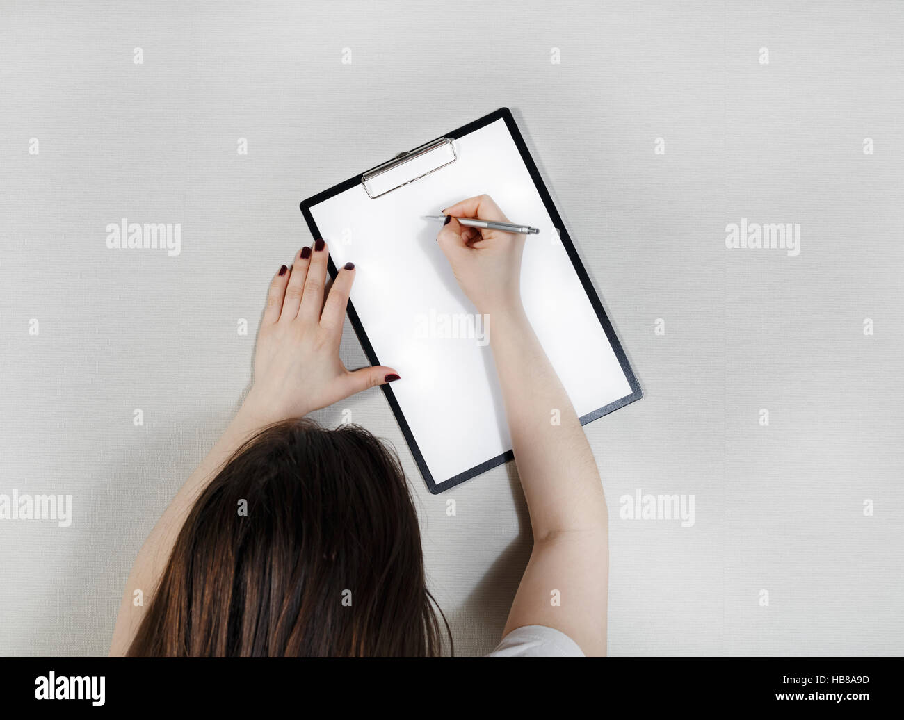 Woman take note on paper hi-res stock photography and images - Alamy