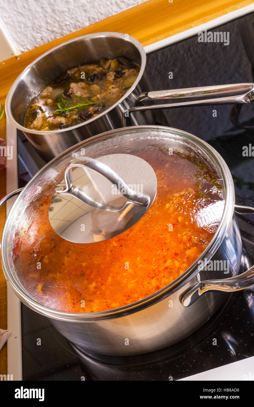 cooking pots on the stove Stock Photo - Alamy