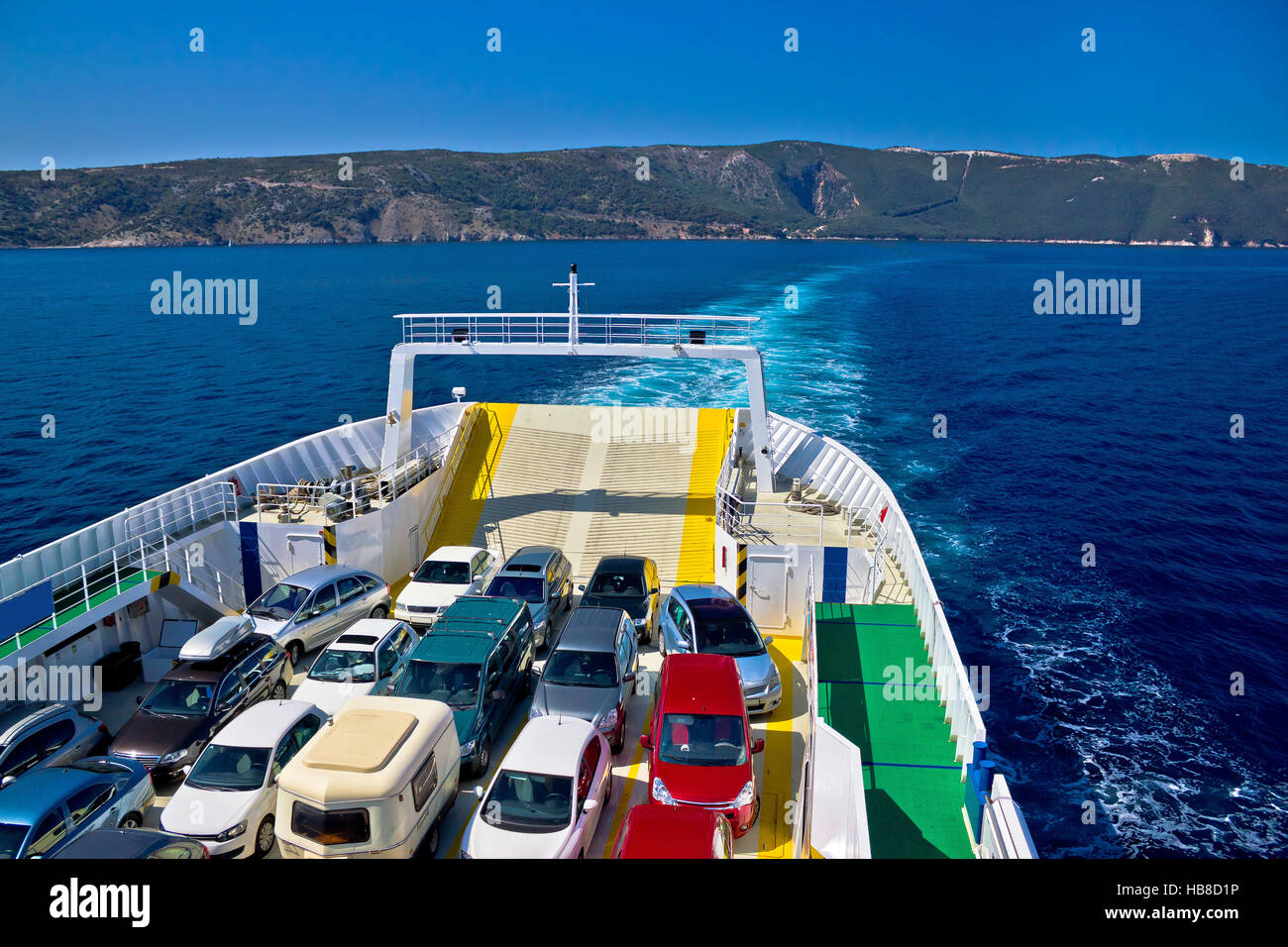 Ferry boat tourist line to island Stock Photo - Alamy
