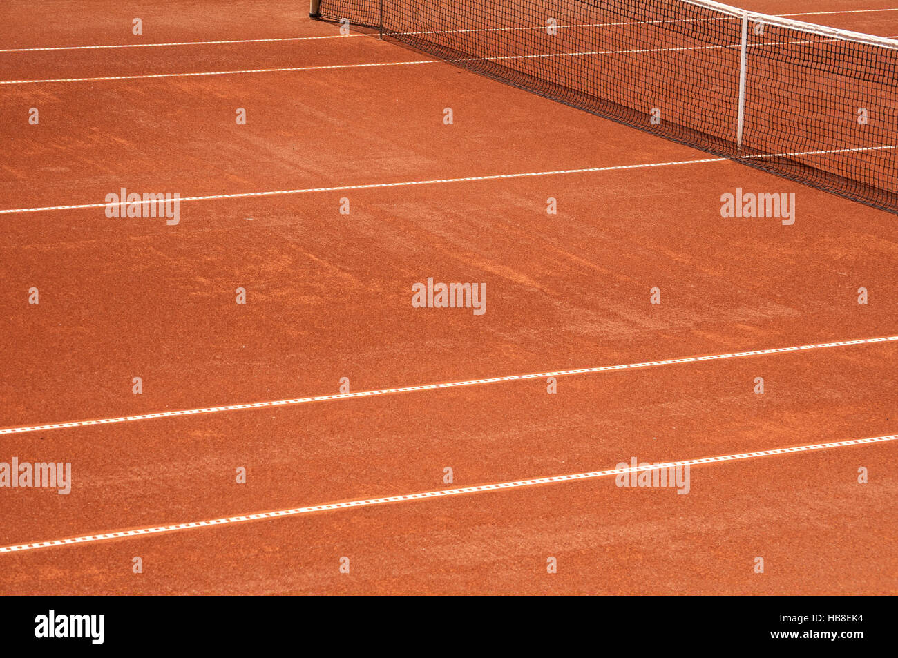 Clay tennis court closeup Stock Photo - Alamy