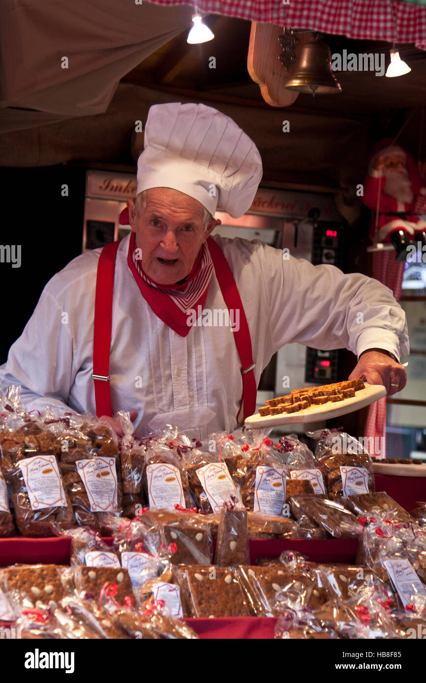 Christmas Fair Market at Ludwigsberg, Germany, chef at a food booth ...