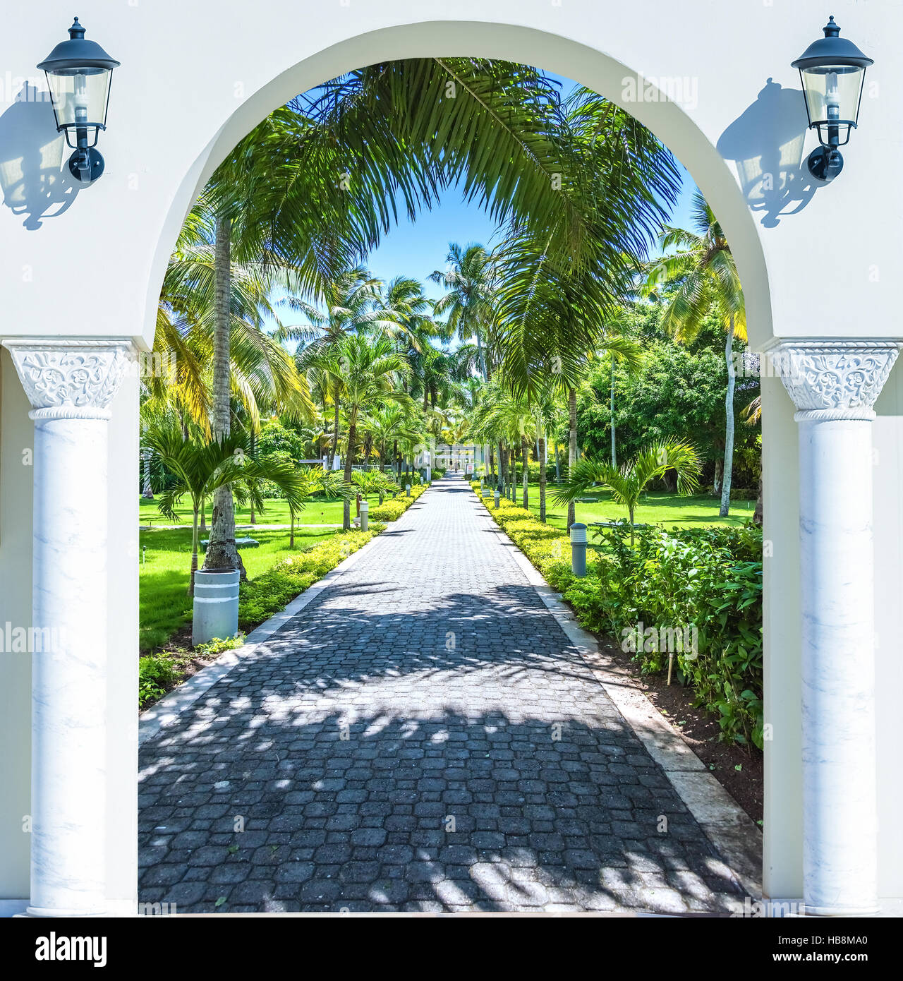open door arch with alley Stock Photo - Alamy