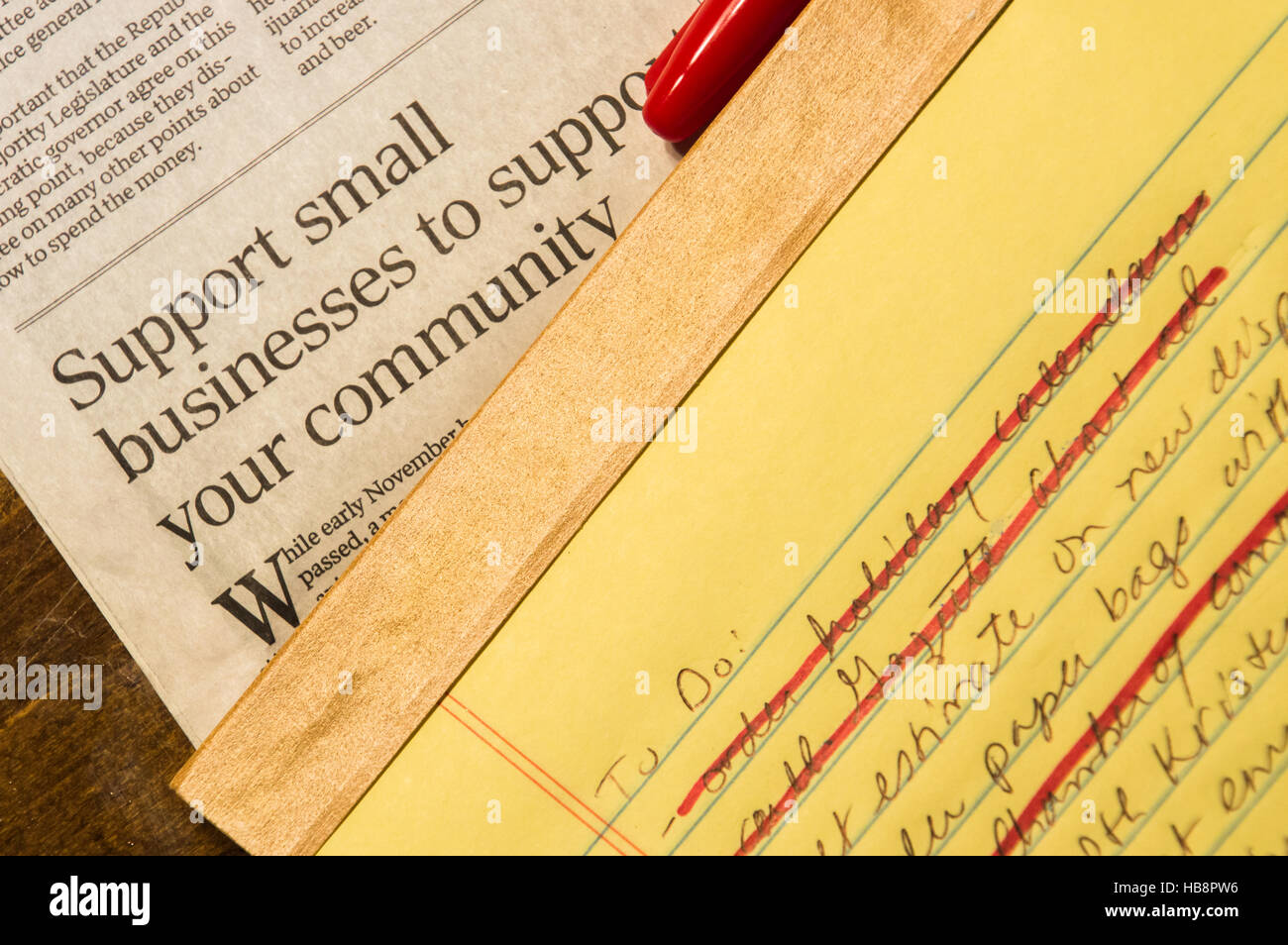 Close up of To Do list with completed items marked out with red ink. A ...