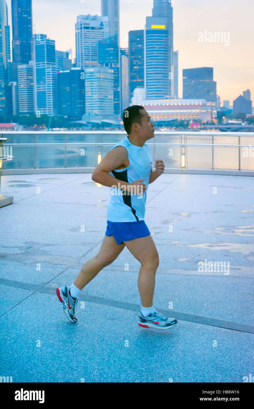 Jogging by the singapore river hi-res stock photography and images - Alamy
