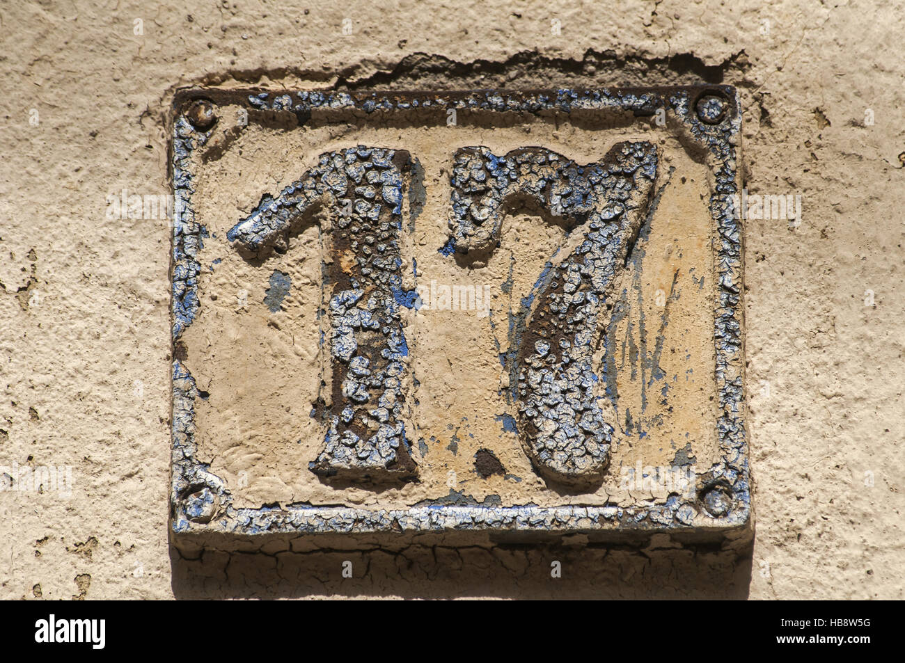 Old retro cast iron plate number 17 Stock Photo - Alamy