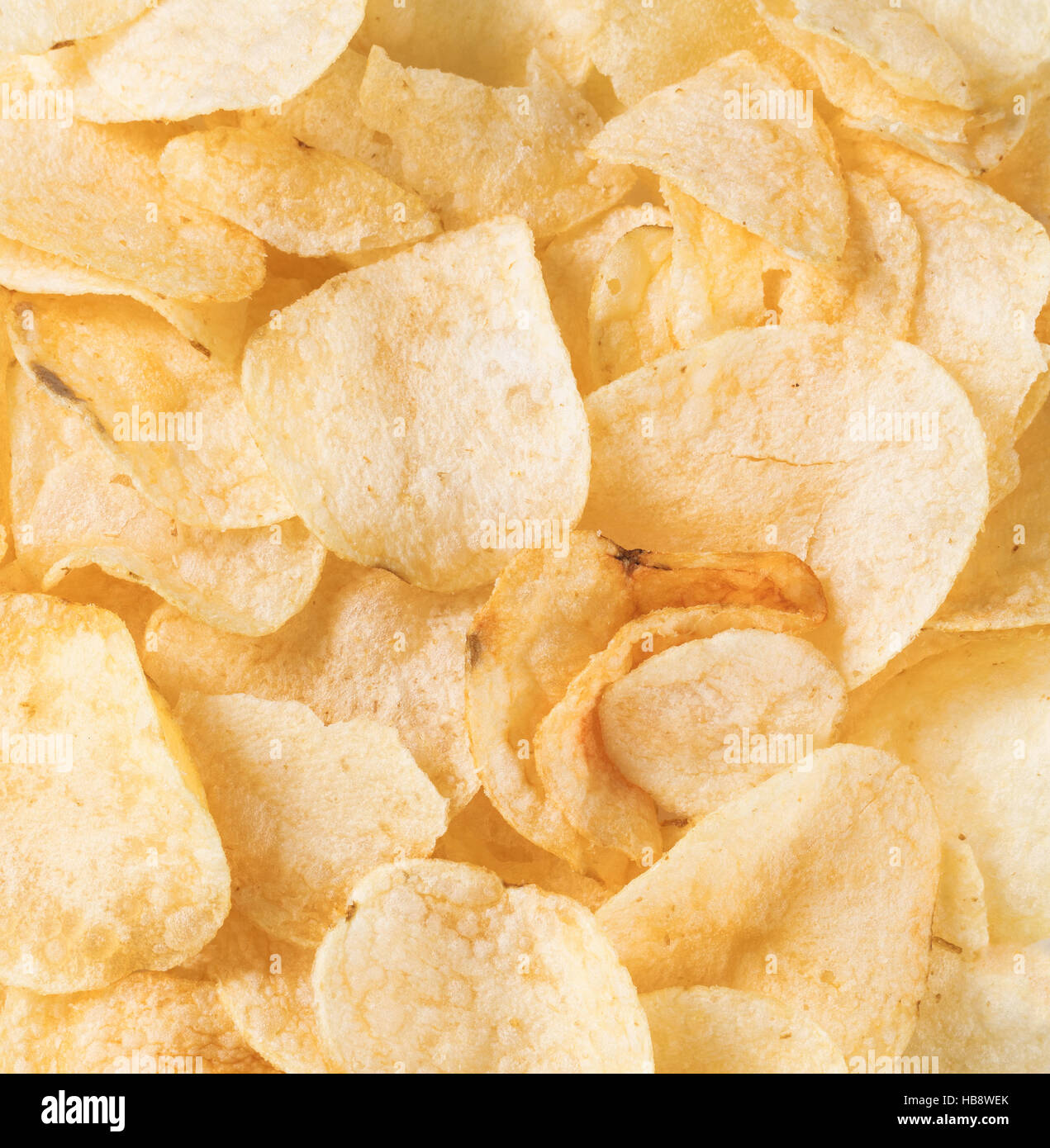 Potato chips in filled frame format Stock Photo - Alamy