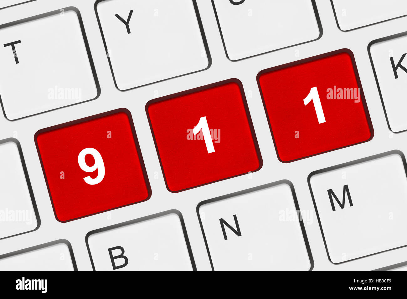 Computer keyboard with 911 key Stock Photo - Alamy