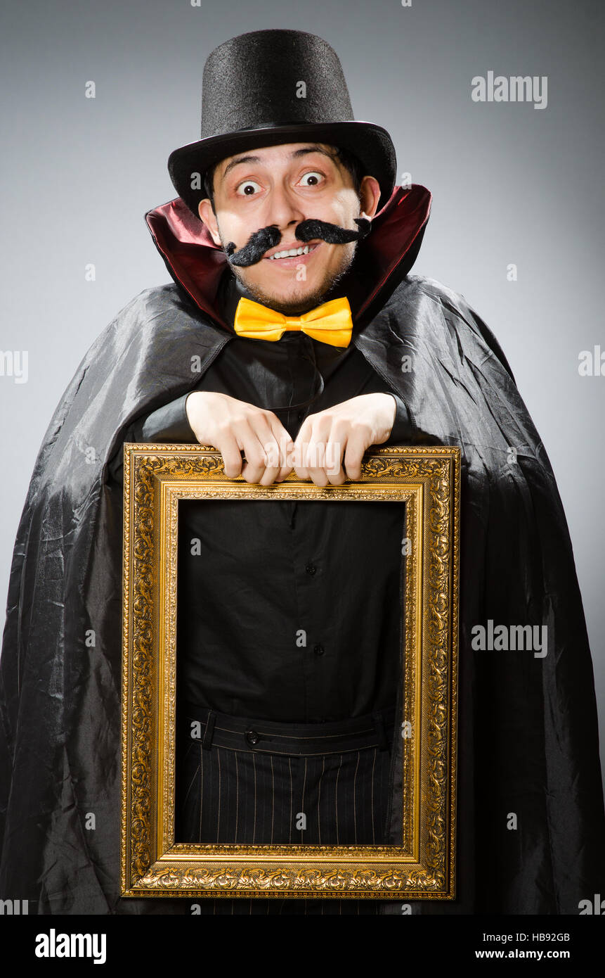 Funny man with picture frame Stock Photo - Alamy