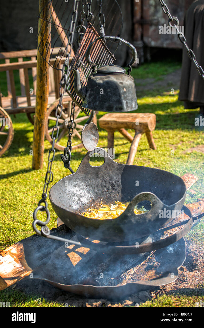 boiling over the fire Stock Photo - Alamy
