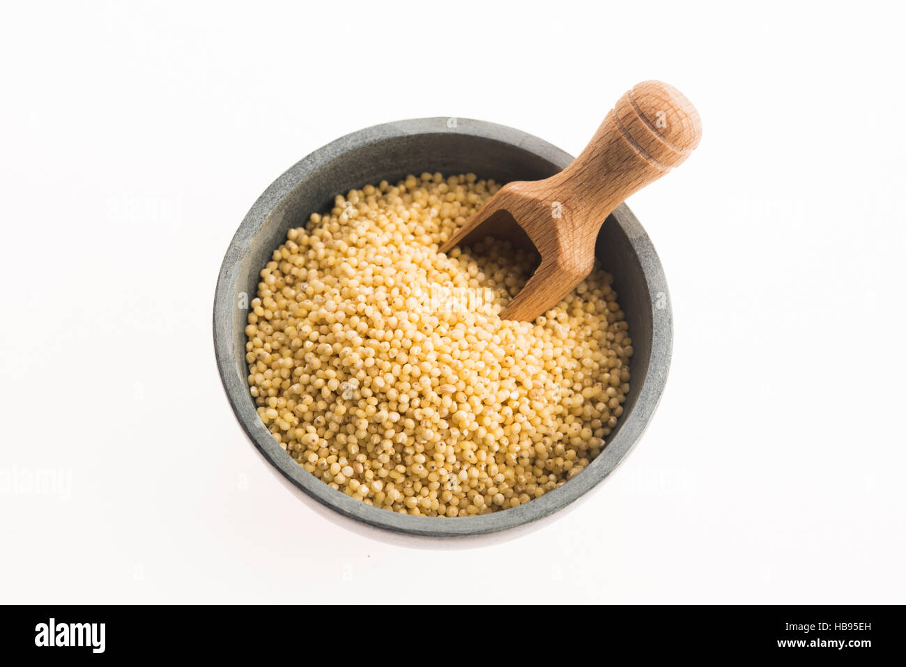 millet groats on white Stock Photo - Alamy