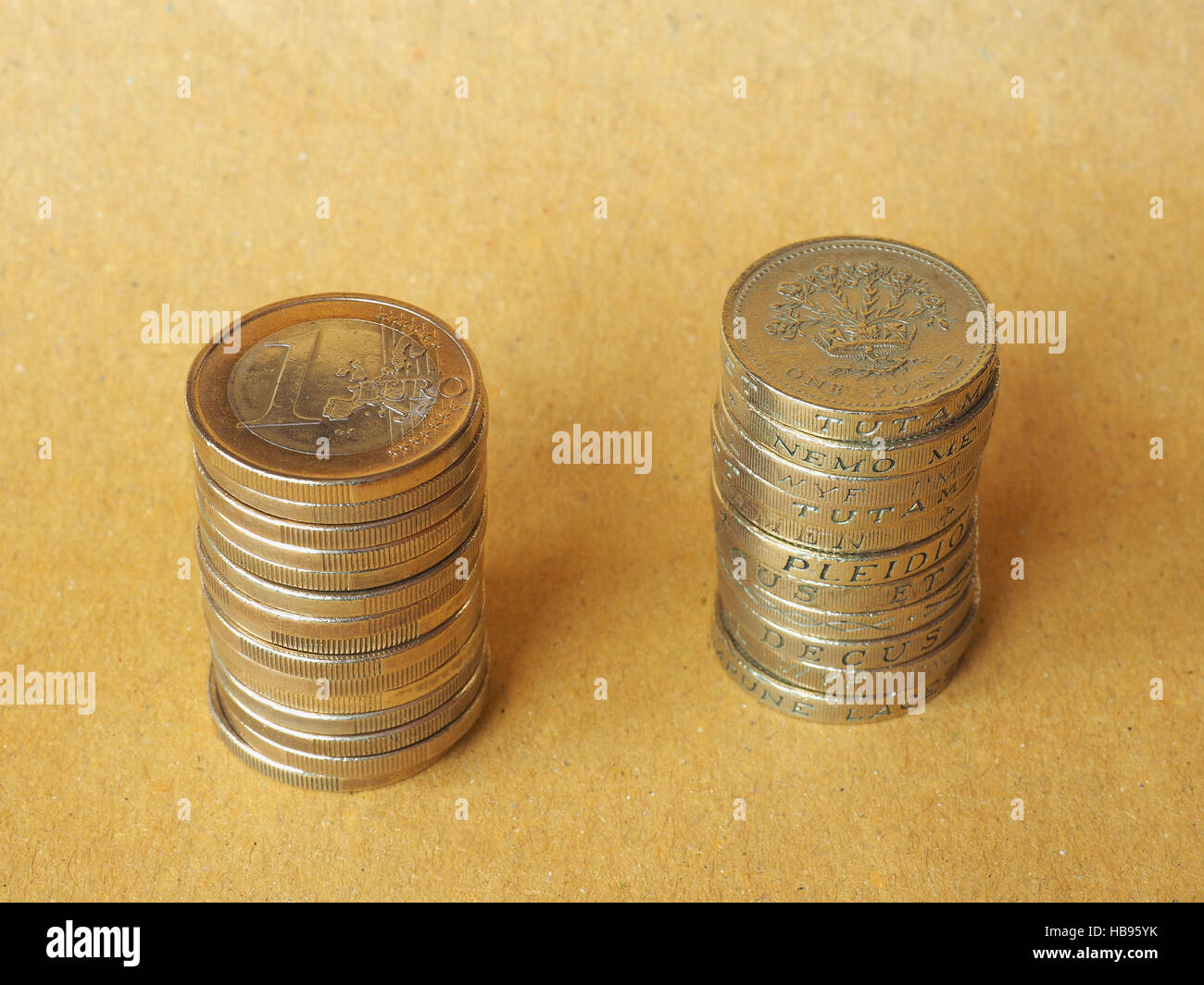 Euro and Pound coins pile Stock Photo - Alamy
