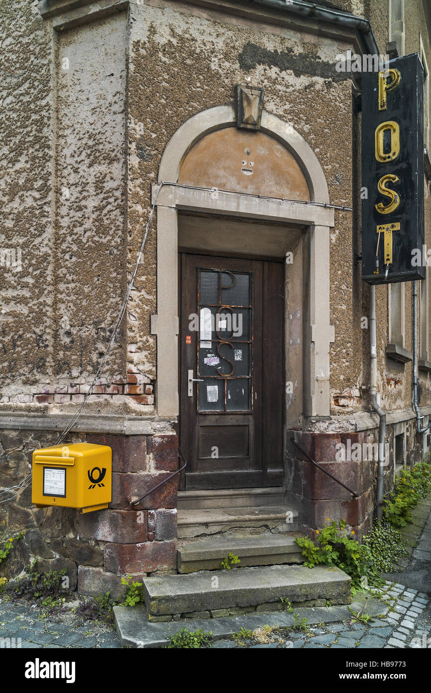 Former GDR post office in the decay Stock Photo - Alamy
