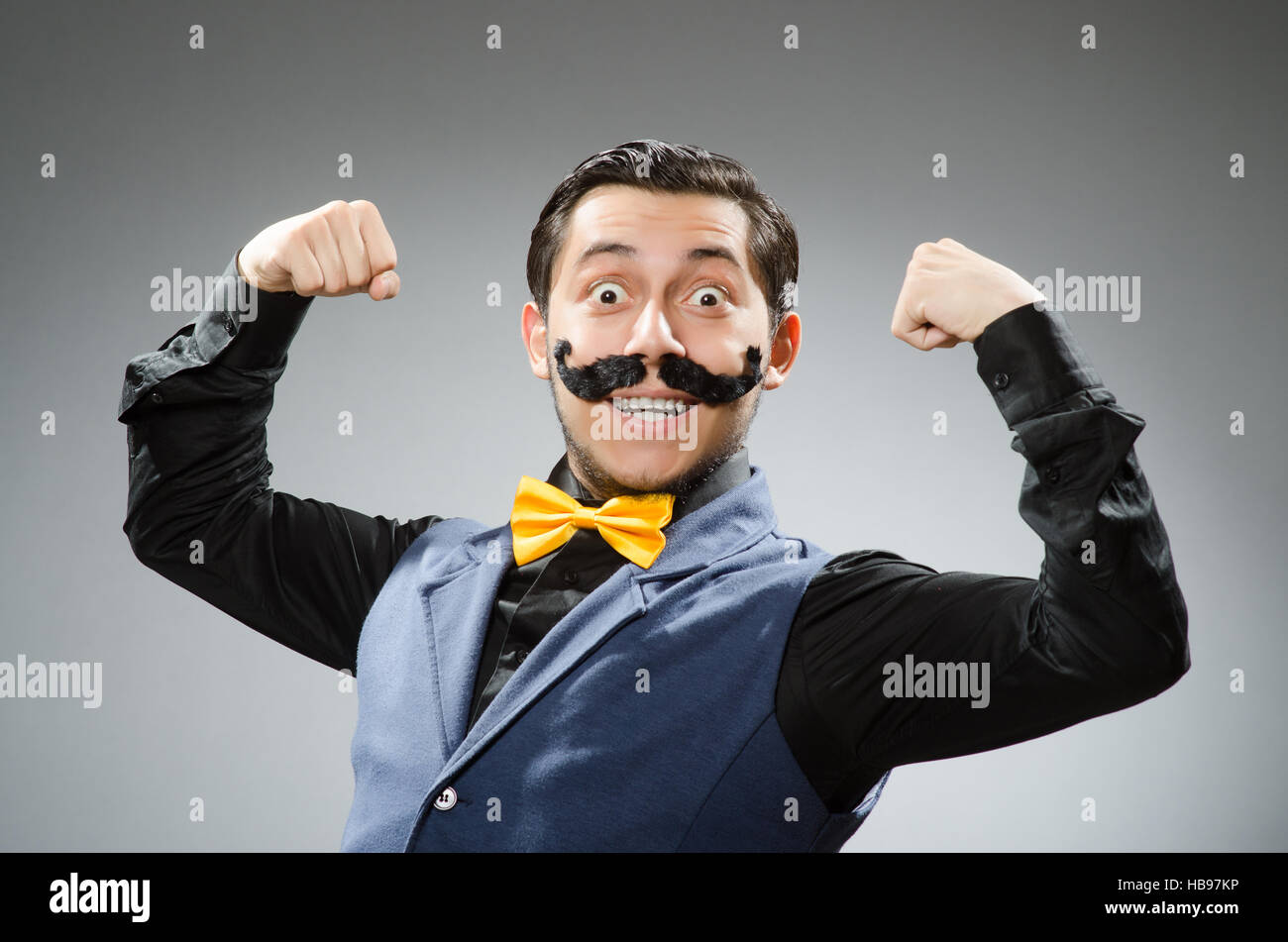 Funny man against dark background Stock Photo - Alamy