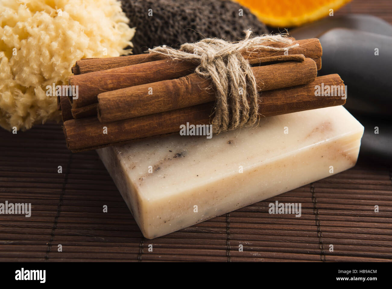 Bar of soap with cinnamon and orange Stock Photo - Alamy