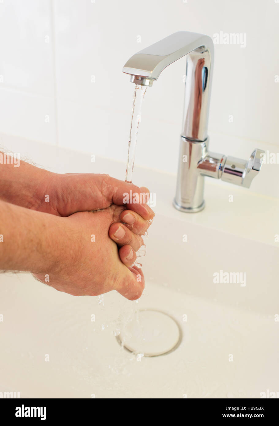 Woman hand running bath hi-res stock photography and images - Alamy