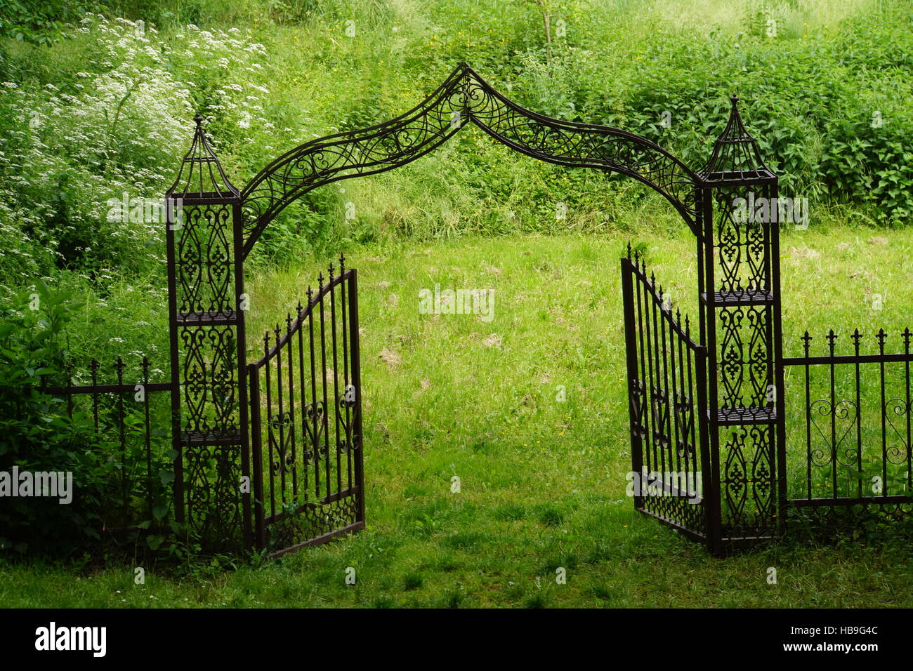 garden gate and meadow Stock Photo - Alamy