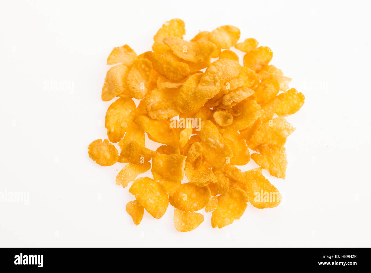 Corn flakes on white background Stock Photo - Alamy