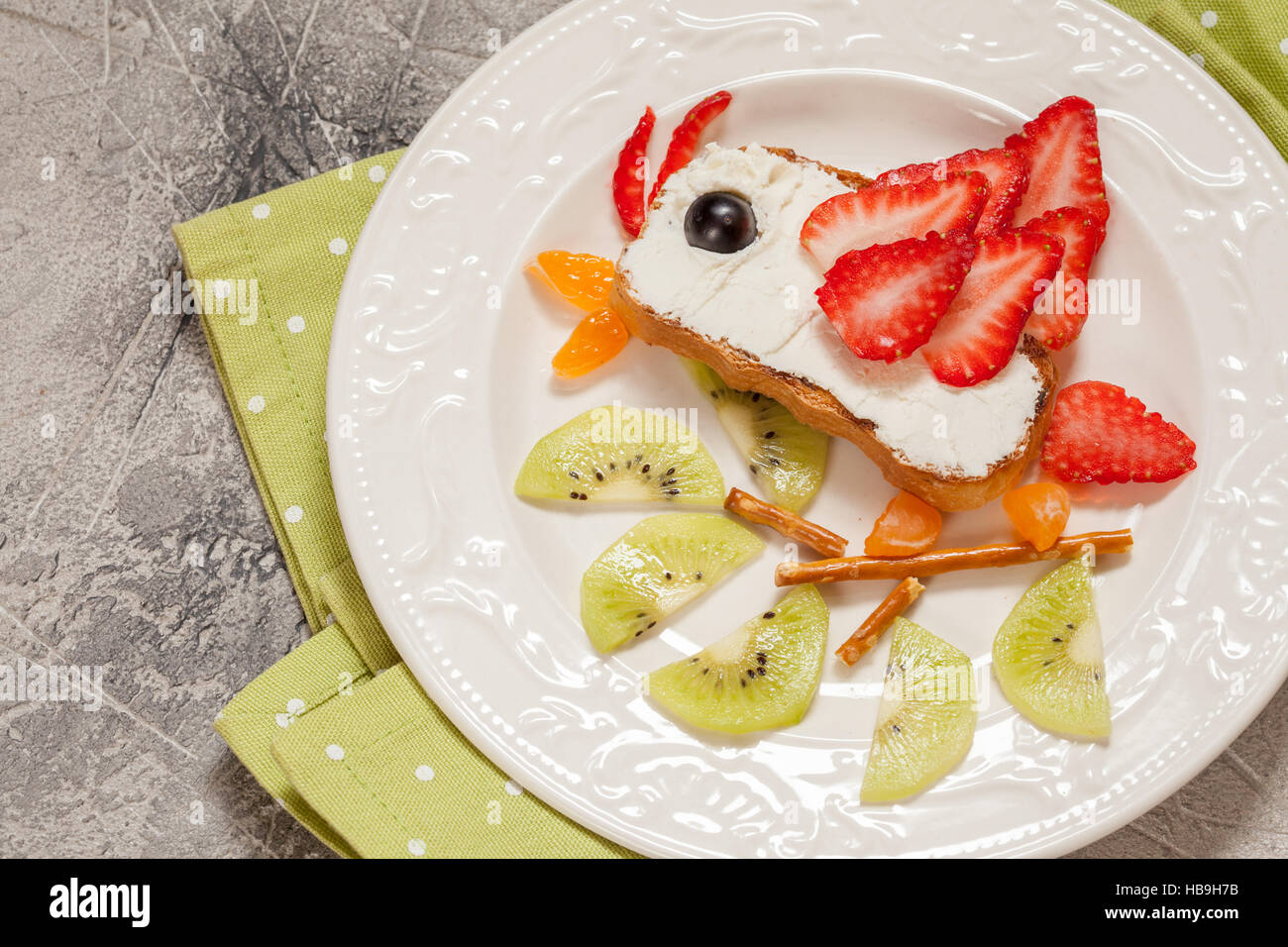 Kid's breakfast toast with fruit Stock Photo - Alamy